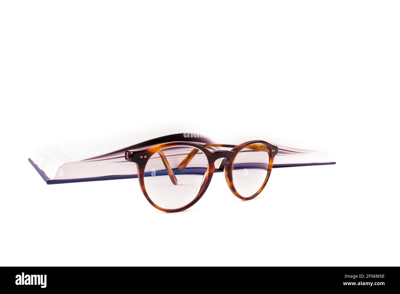 Open book with glasses hi-res stock photography and images - Alamy