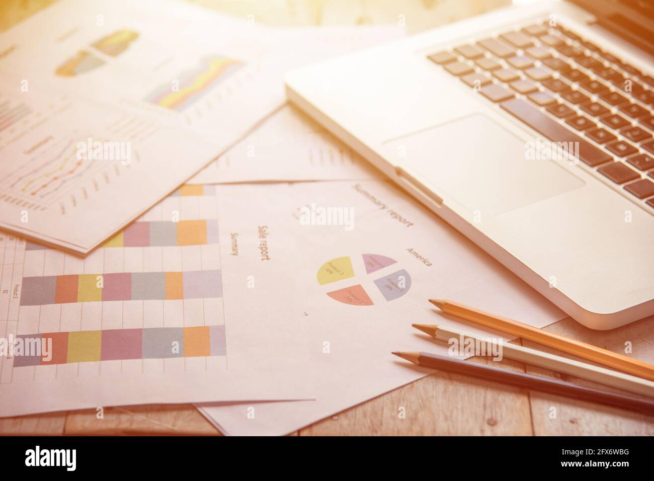 Office desk a stack of paper reports work forms with computer. Modern ...