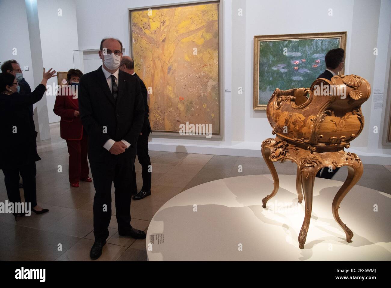 Prime Minister Jean Castex watches art pieces during a visit at the ...