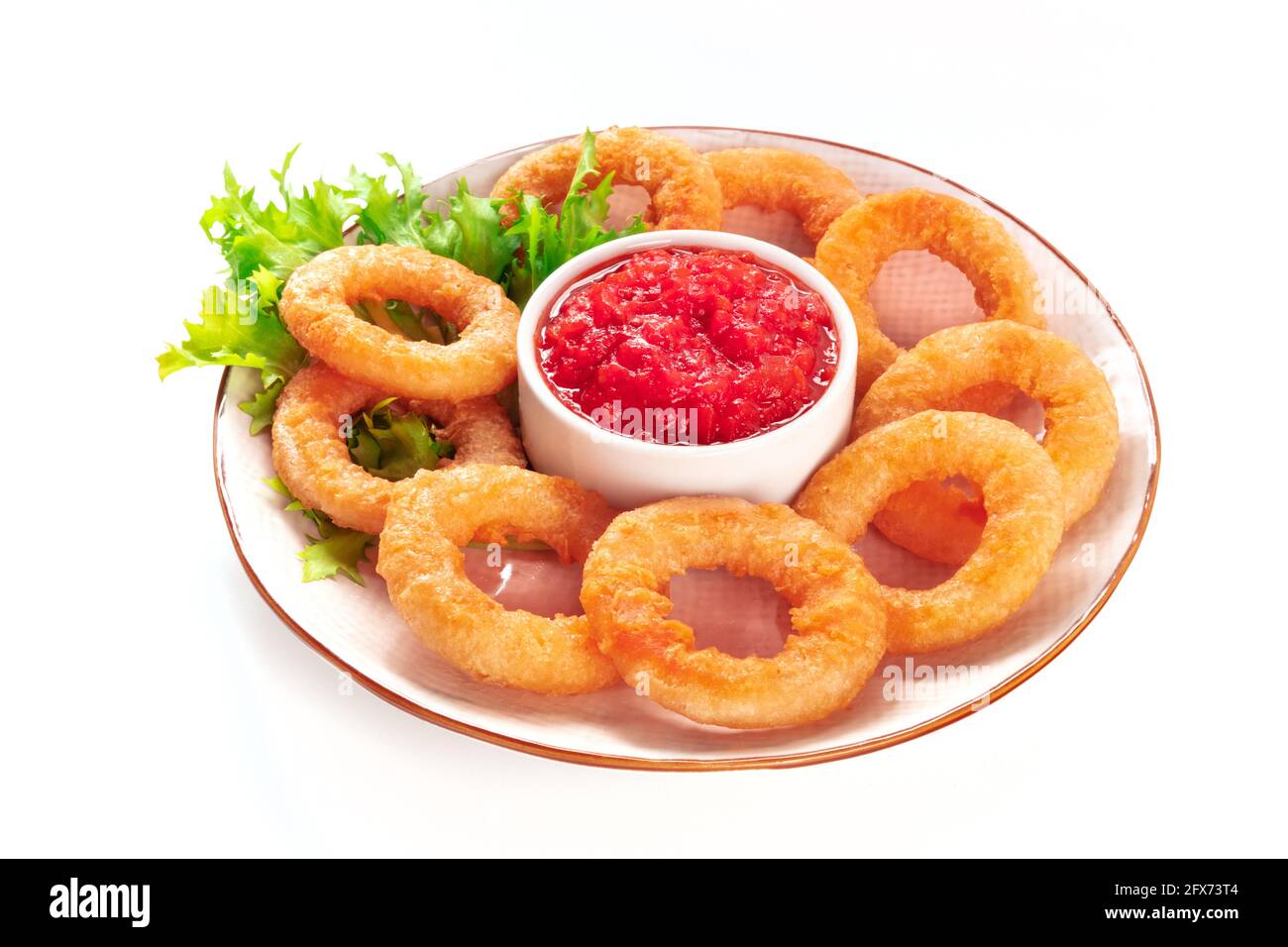 Calamari rings, isolated. Deep fried squid rings with green salad ...