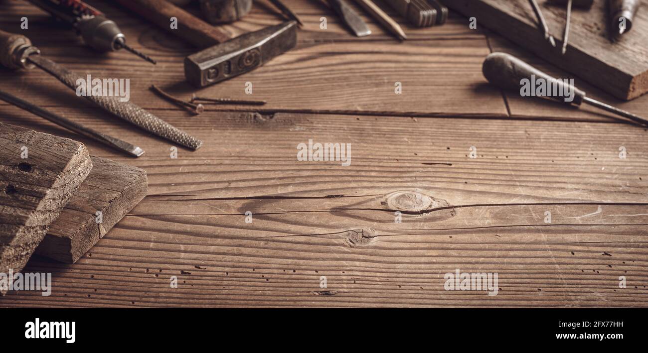 Professional vintage carpentry tools on a rustic wooden table, woodwork ...