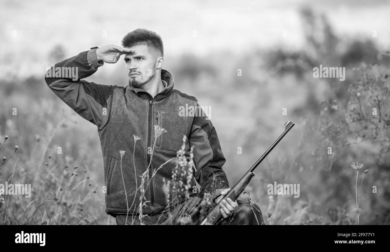 Hunting hunter brutal man Black and White Stock Photos & Images - Alamy