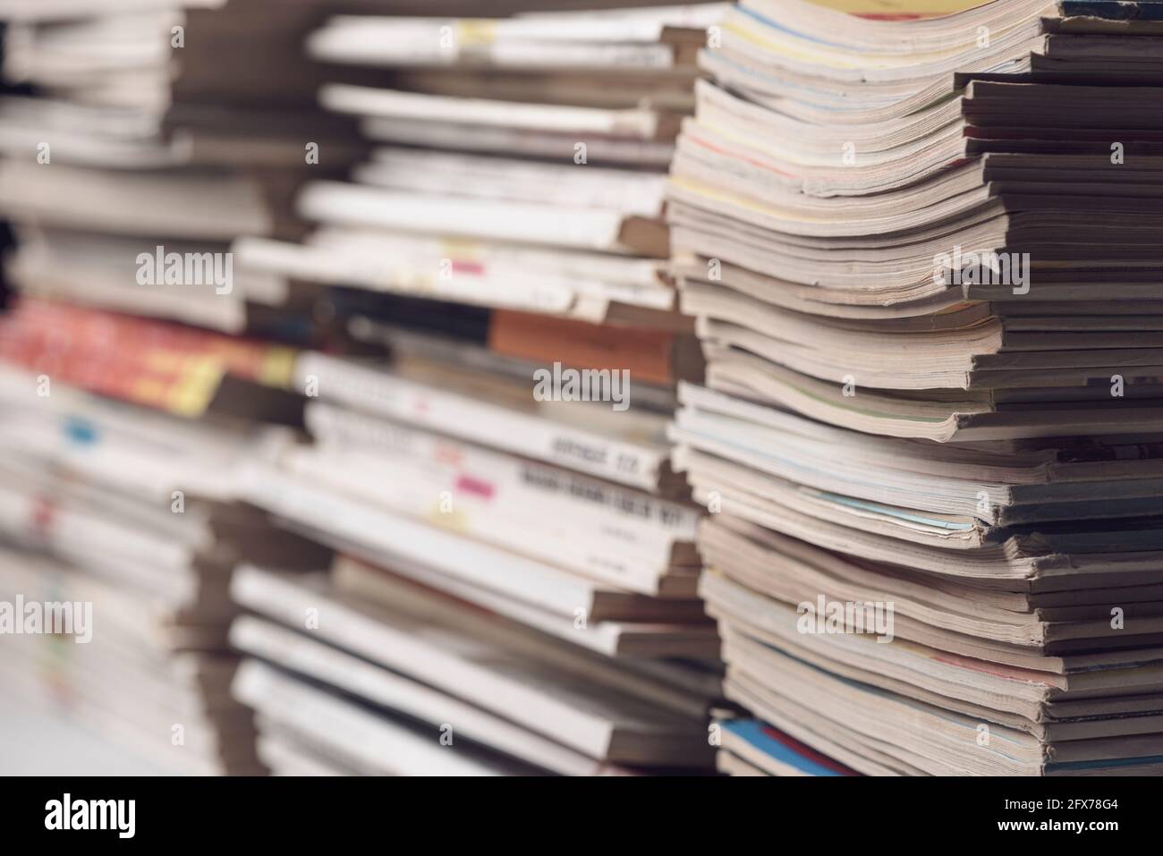 Stacks of magazines close up: printed media and information concept ...