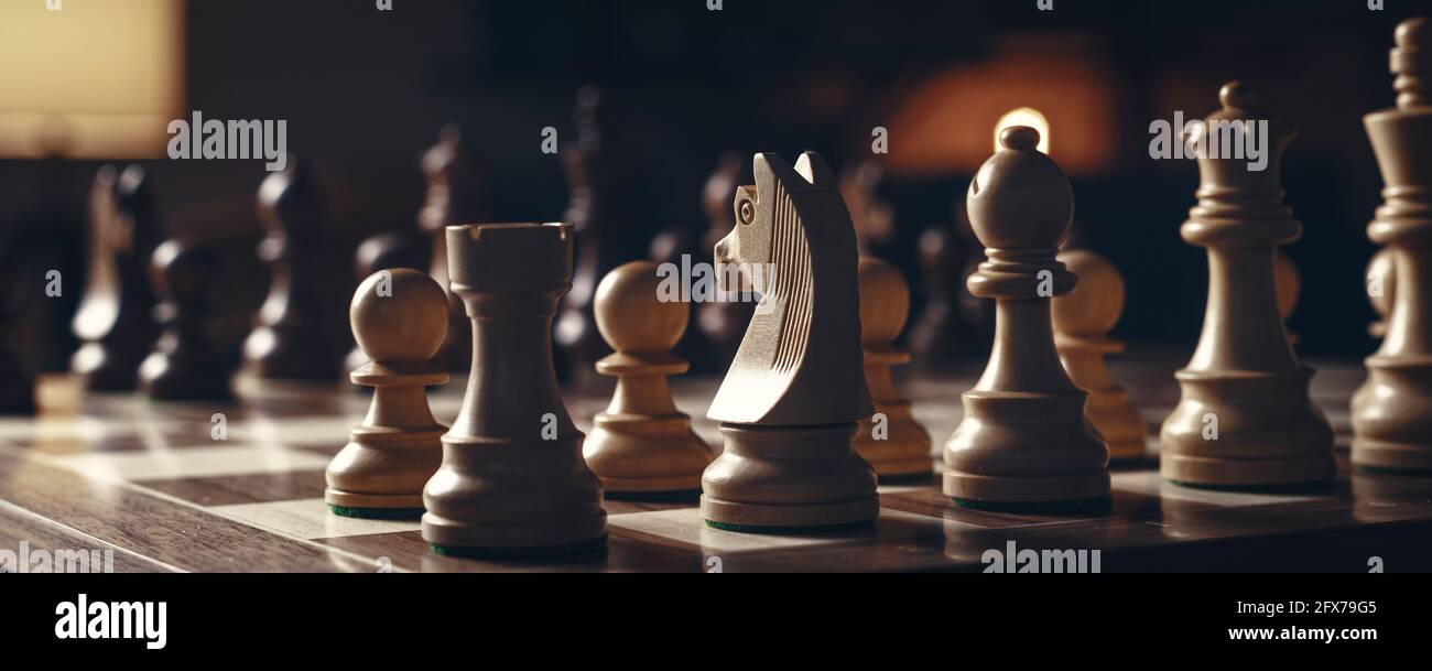 Chess pieces arranged on the chessboard, strategy games concept Stock ...
