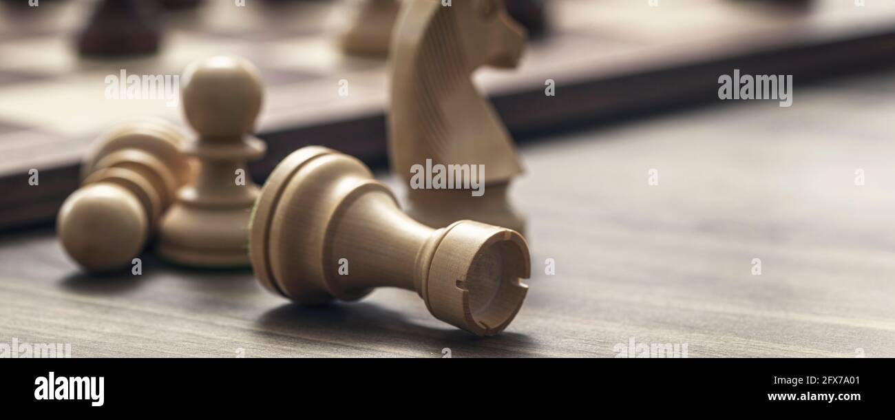 Wooden chess pieces and chessboard close up Stock Photo - Alamy