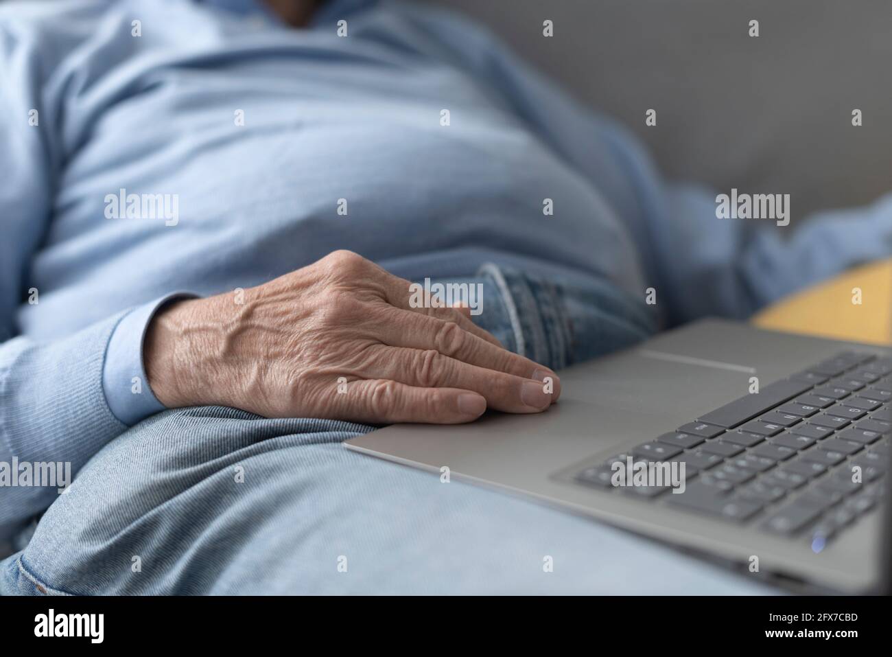 Man Sitting Sprawled High Resolution Stock Photography and Images - Alamy