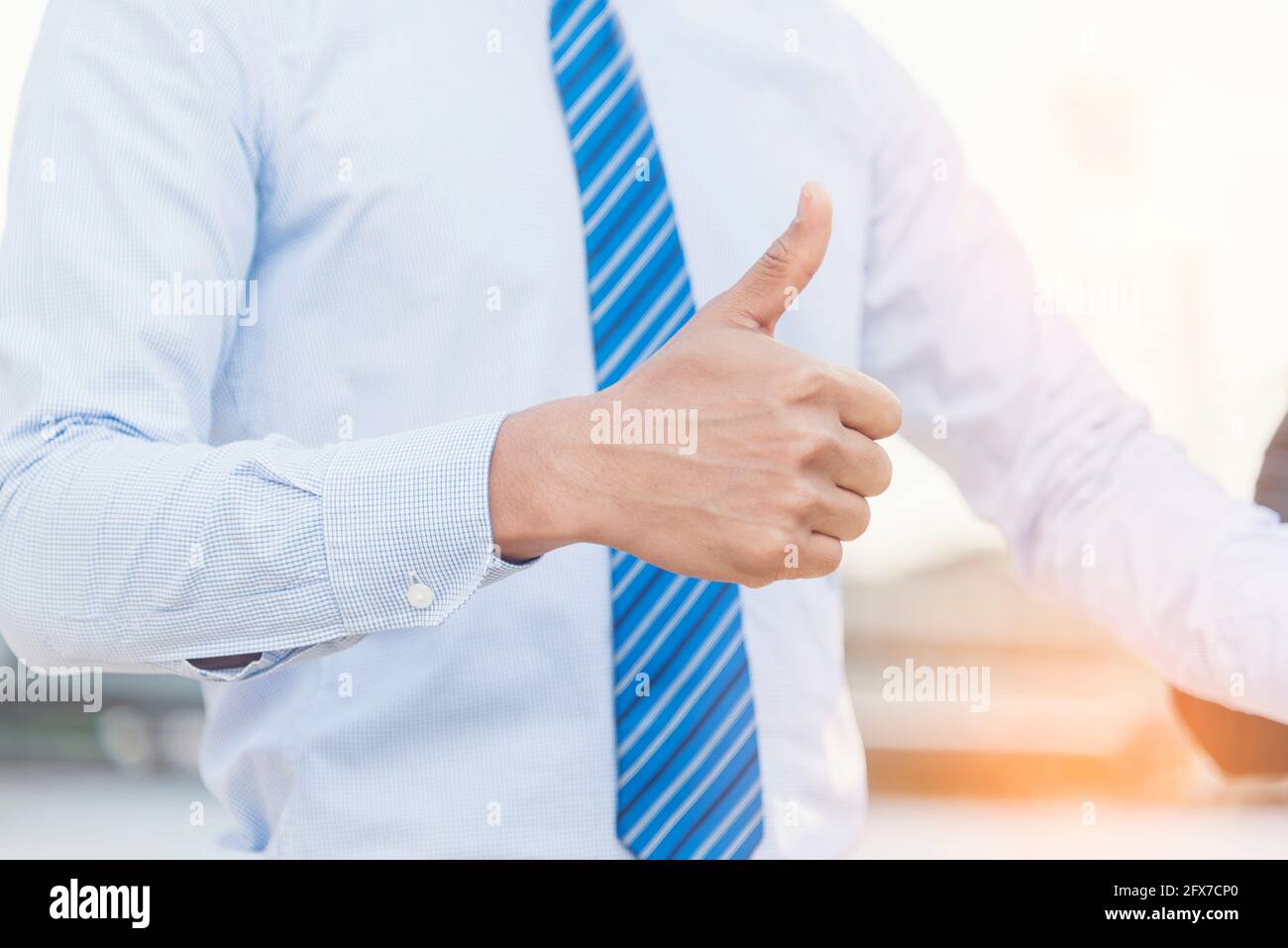 Satisfaction happy businessman showing thumbs up for good work ...