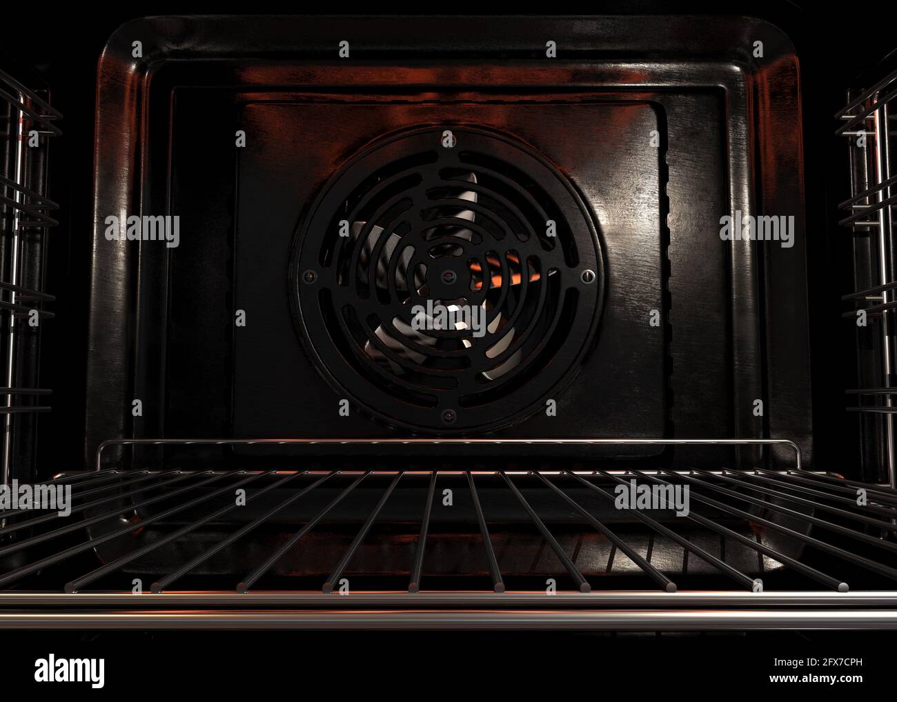 An upclose view of the inside of an empty operational household oven ...