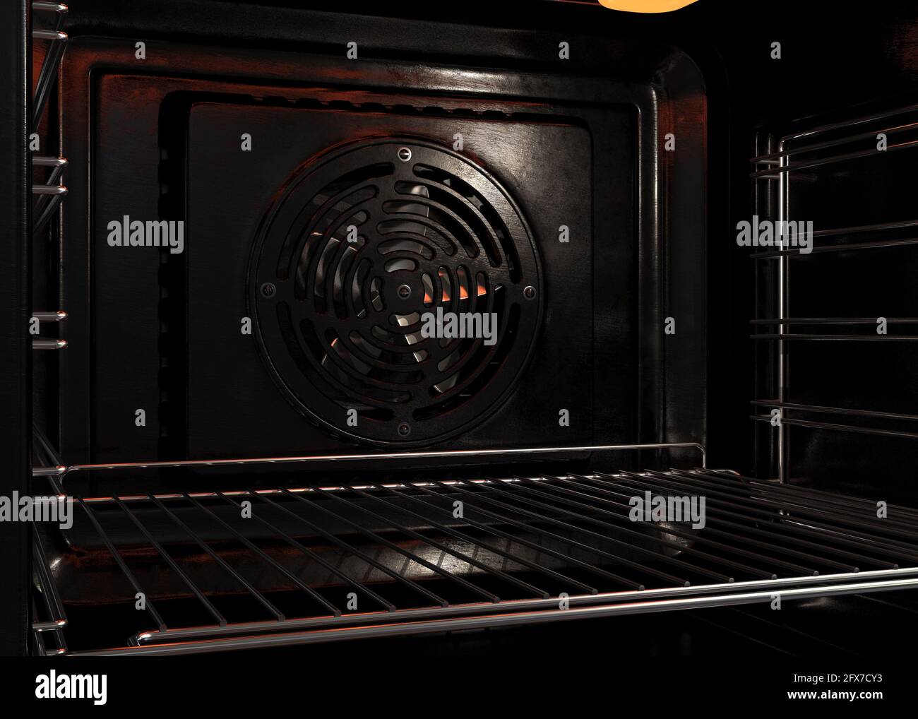 An upclose view of the inside of an empty operational household oven ...