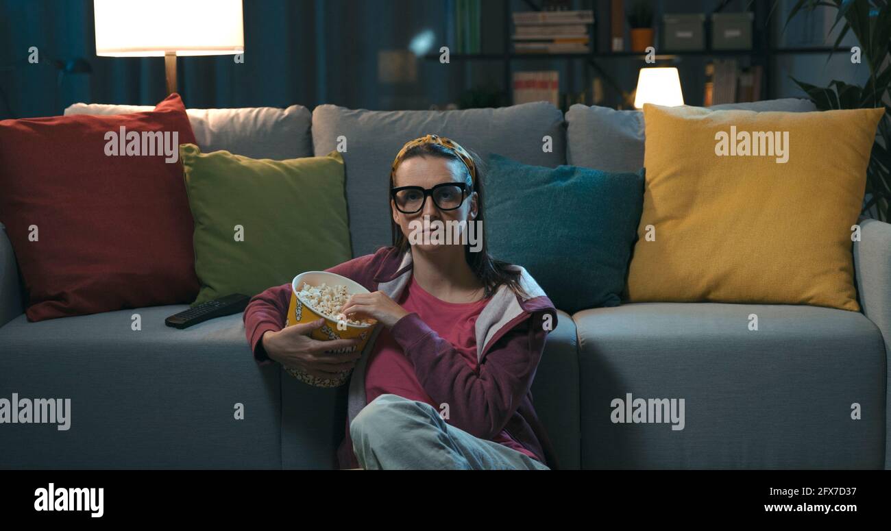 Woman binge eating watching tv hi-res stock photography and images - Alamy