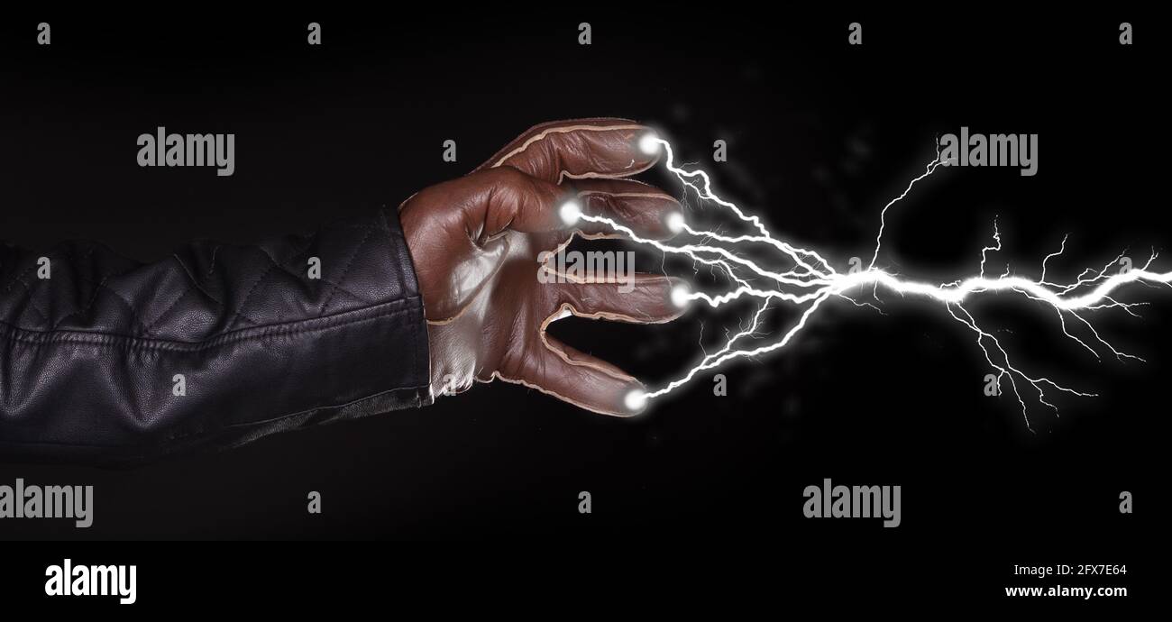 Hand shooting out a bolt of lightning - Dark and mysterious, isolated ...