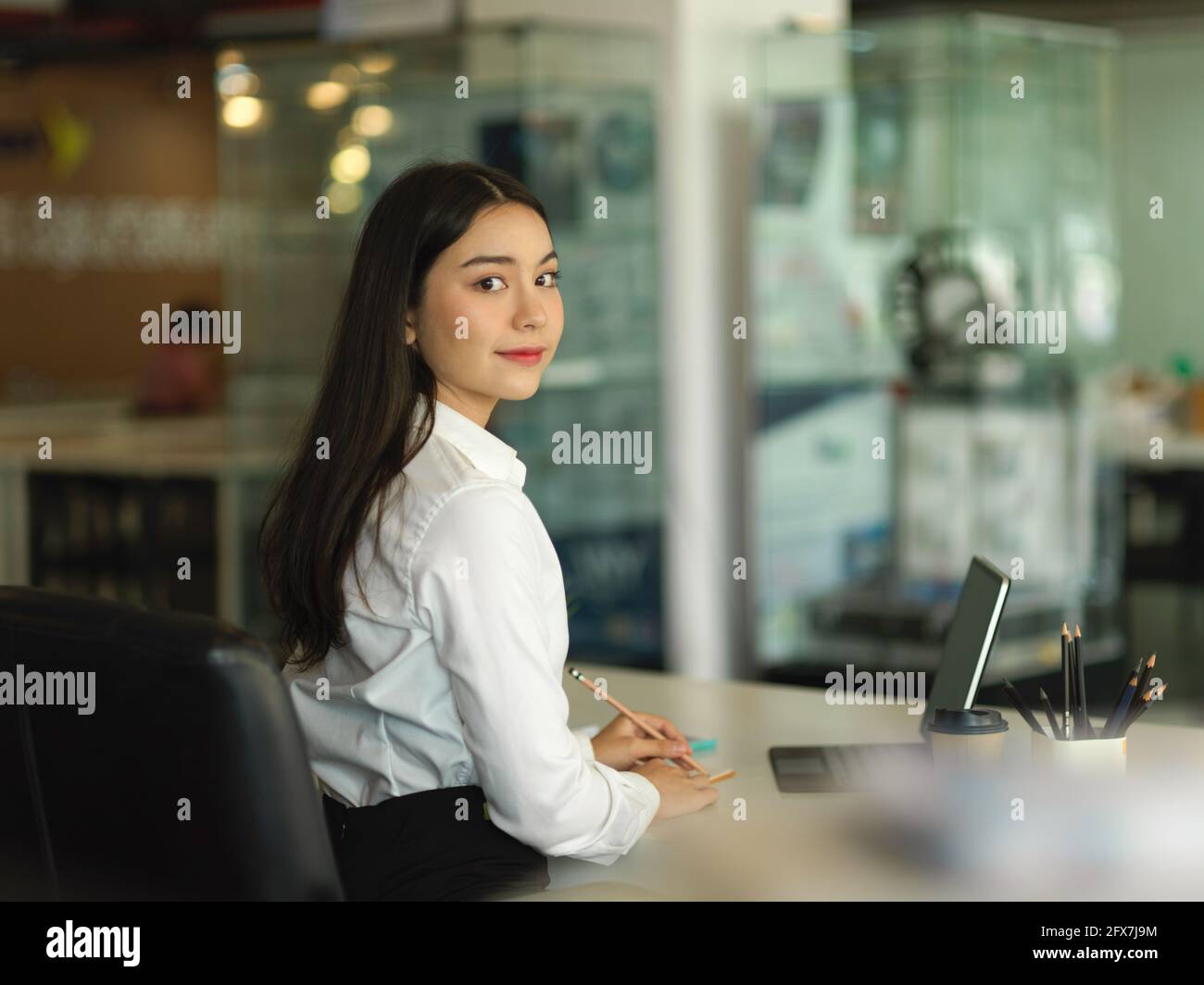 Beautiful female office worker hi-res stock photography and images - Alamy