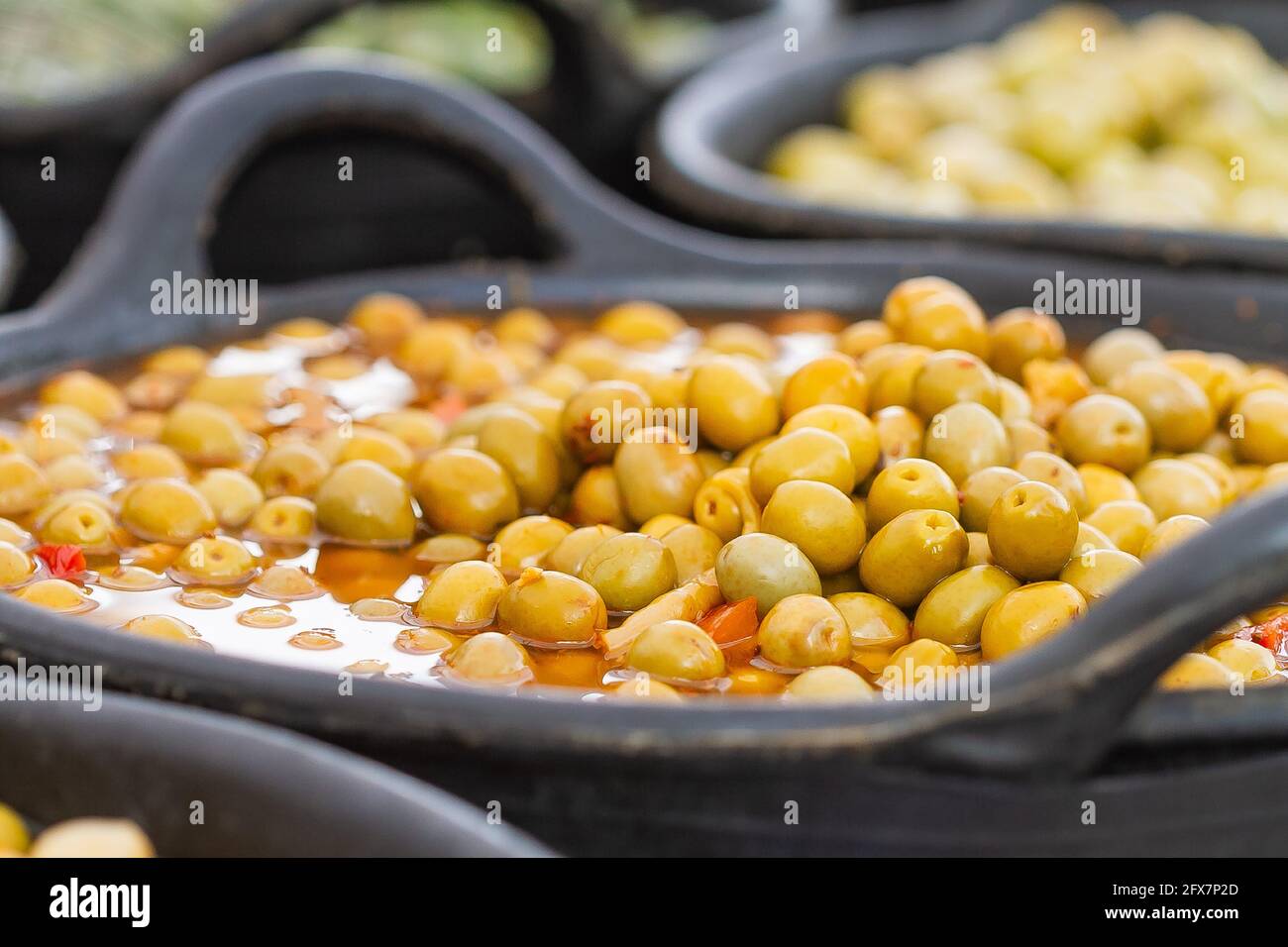 Bulk of green olives ready for sale Stock Photo - Alamy