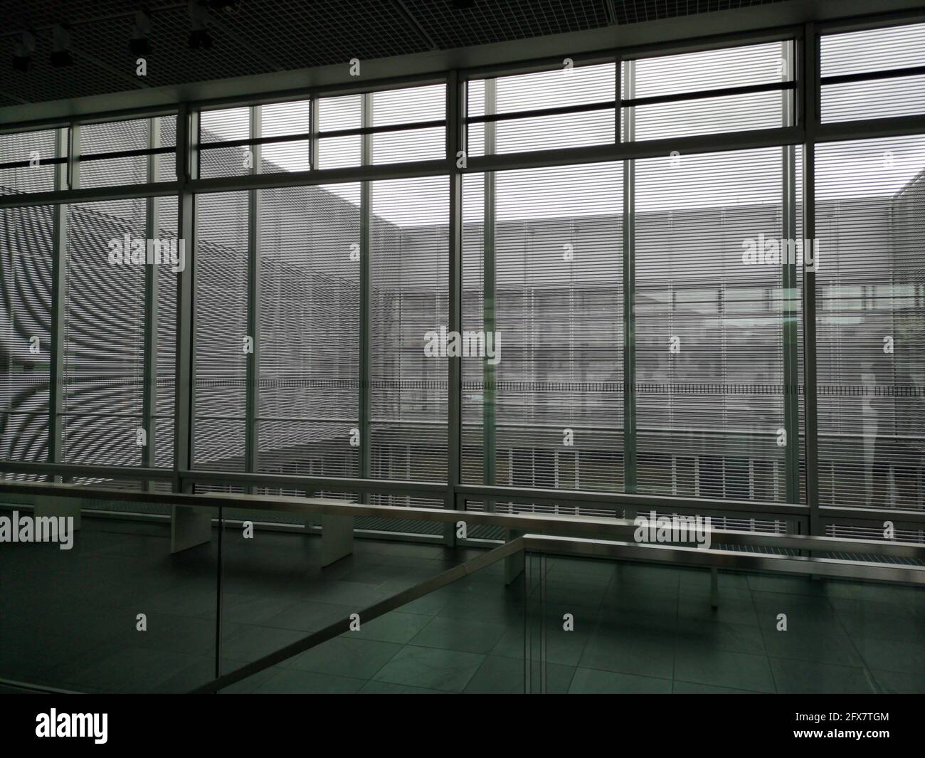Building interior with large wide windows Stock Photo - Alamy