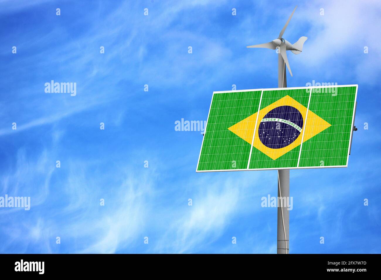 Solar panels against a blue sky with a picture of the flag of Brazil ...