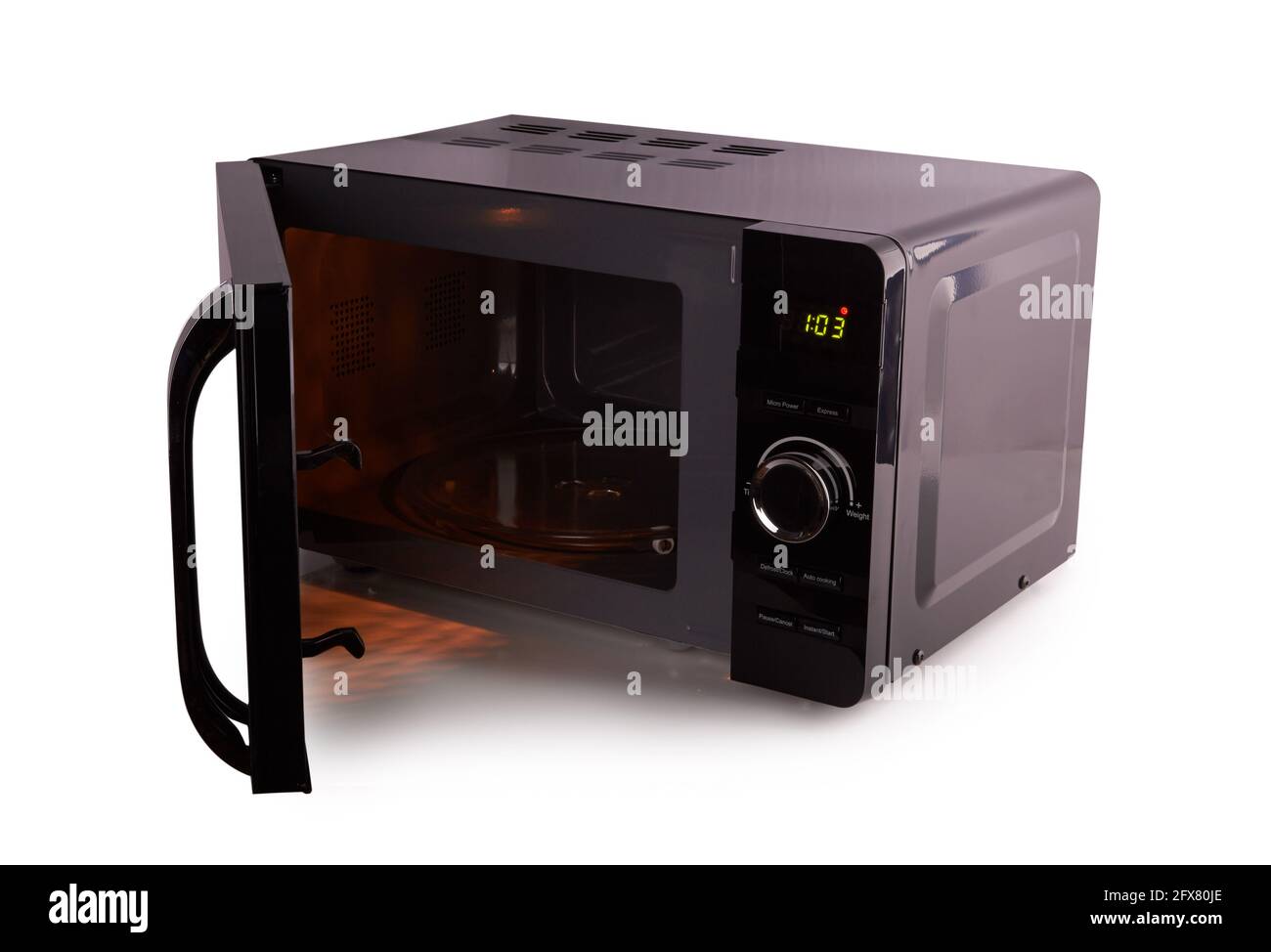 open microwave oven isolated on a white background Stock Photo - Alamy
