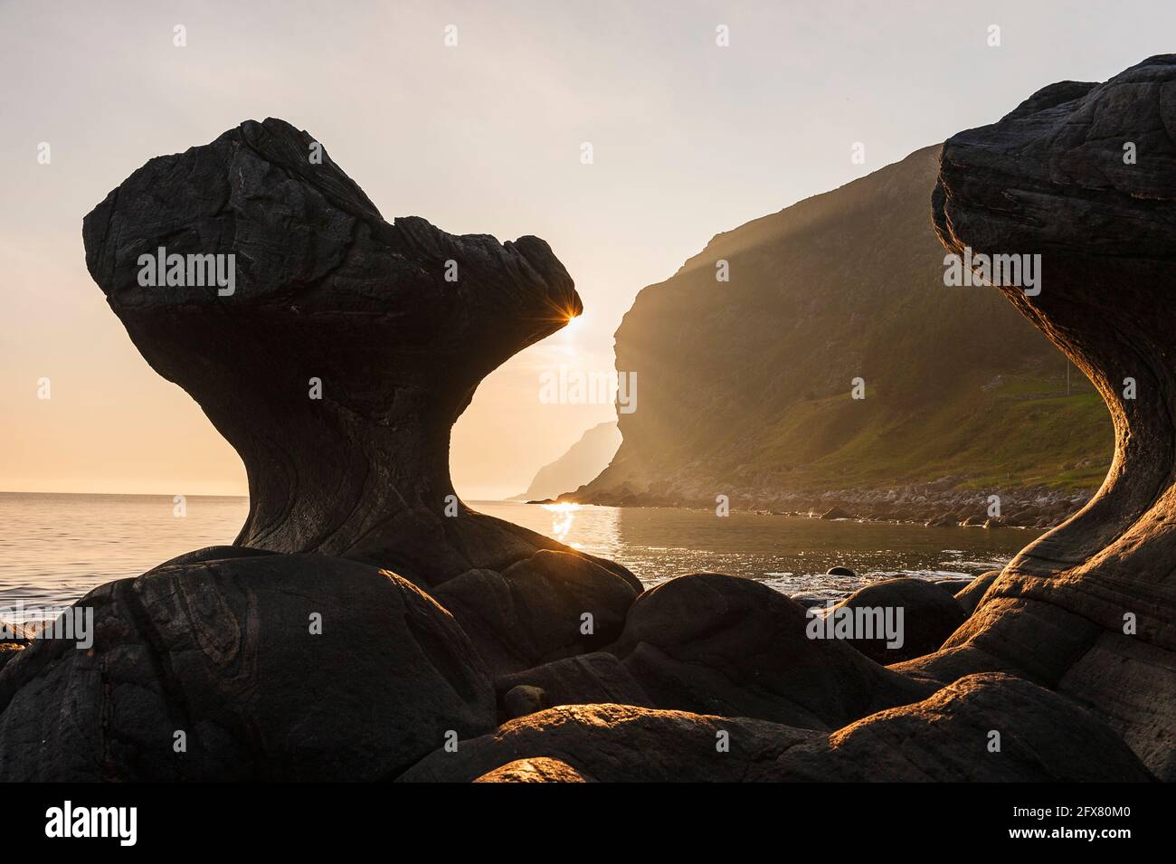 Stone shaped by waves, ice and stone Stock Photo - Alamy