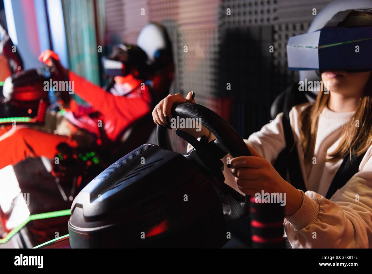 Girl playing racing car game hi-res stock photography and images - Alamy