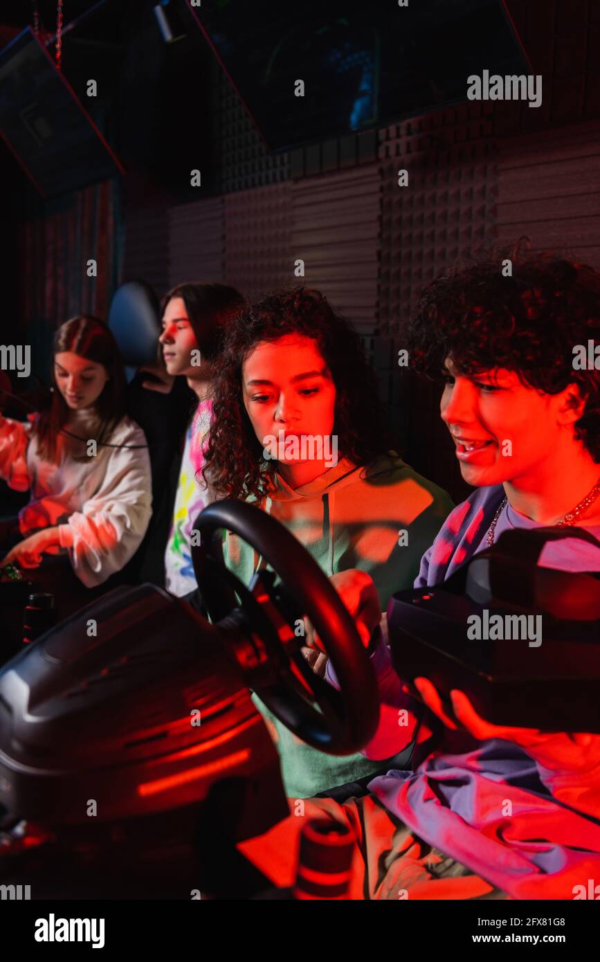 Boys in racing car simulator hi-res stock photography and images - Alamy