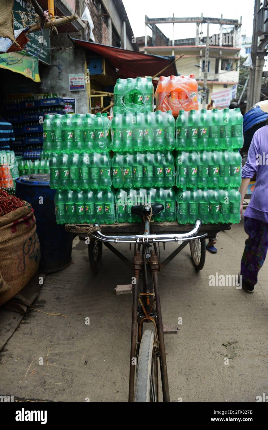 Crates of 7up soft drink transported on bicycle at the Chawk Bazar in ...