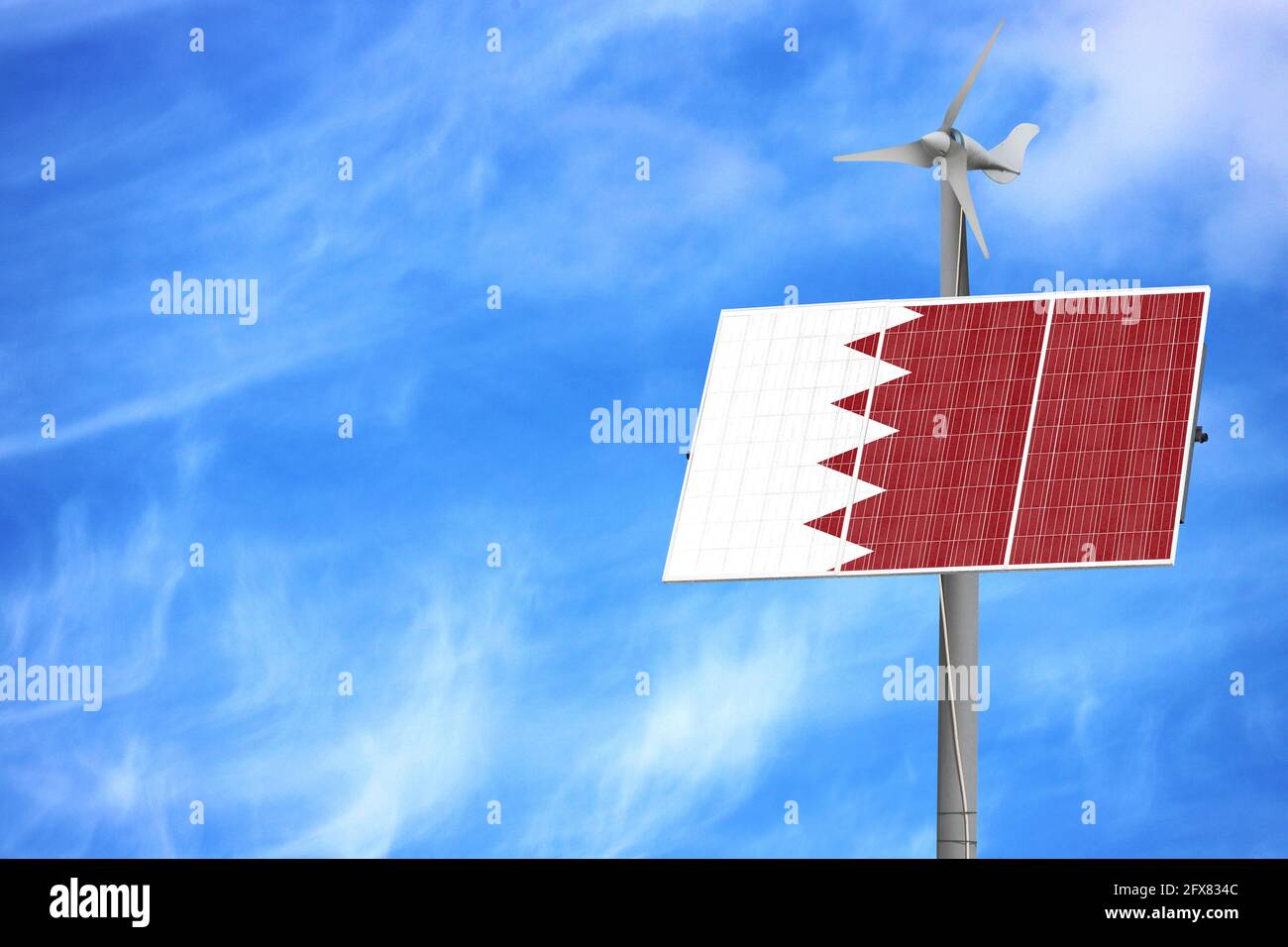 Solar panels against a blue sky with a picture of the flag of Bahrain ...