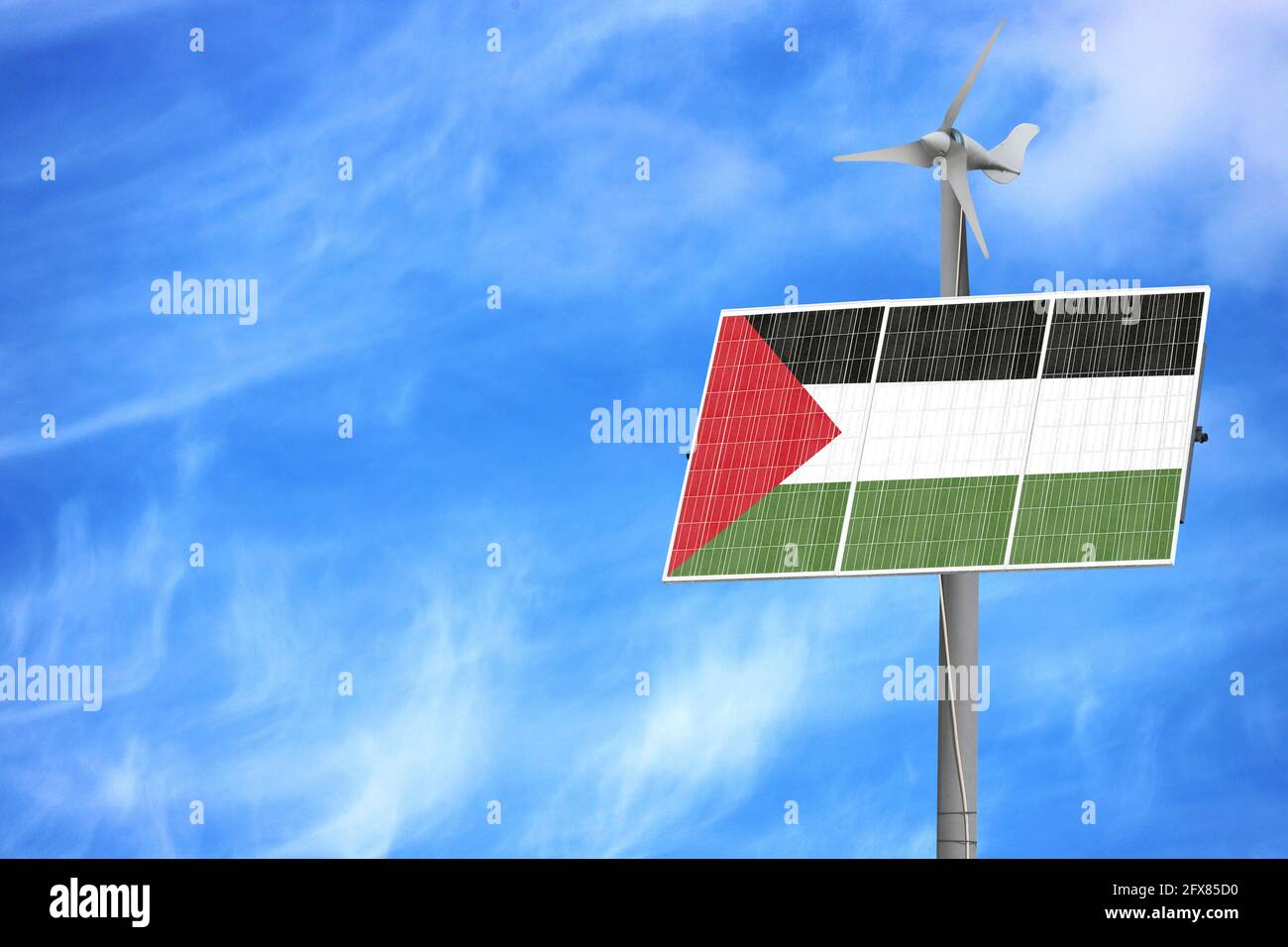 Solar panels against a blue sky with a picture of the flag of Palestine ...