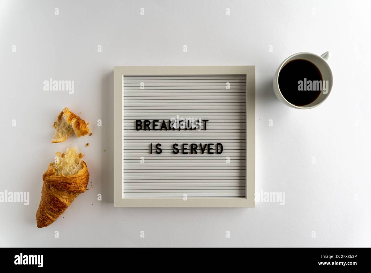Letterboard With Words That Spell Breakfast Is Served with a croissant ...