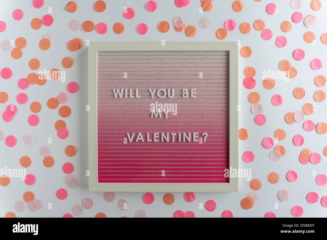 Pink Letterboard Words That Spell Will You Be My Valentine?, on a white ...