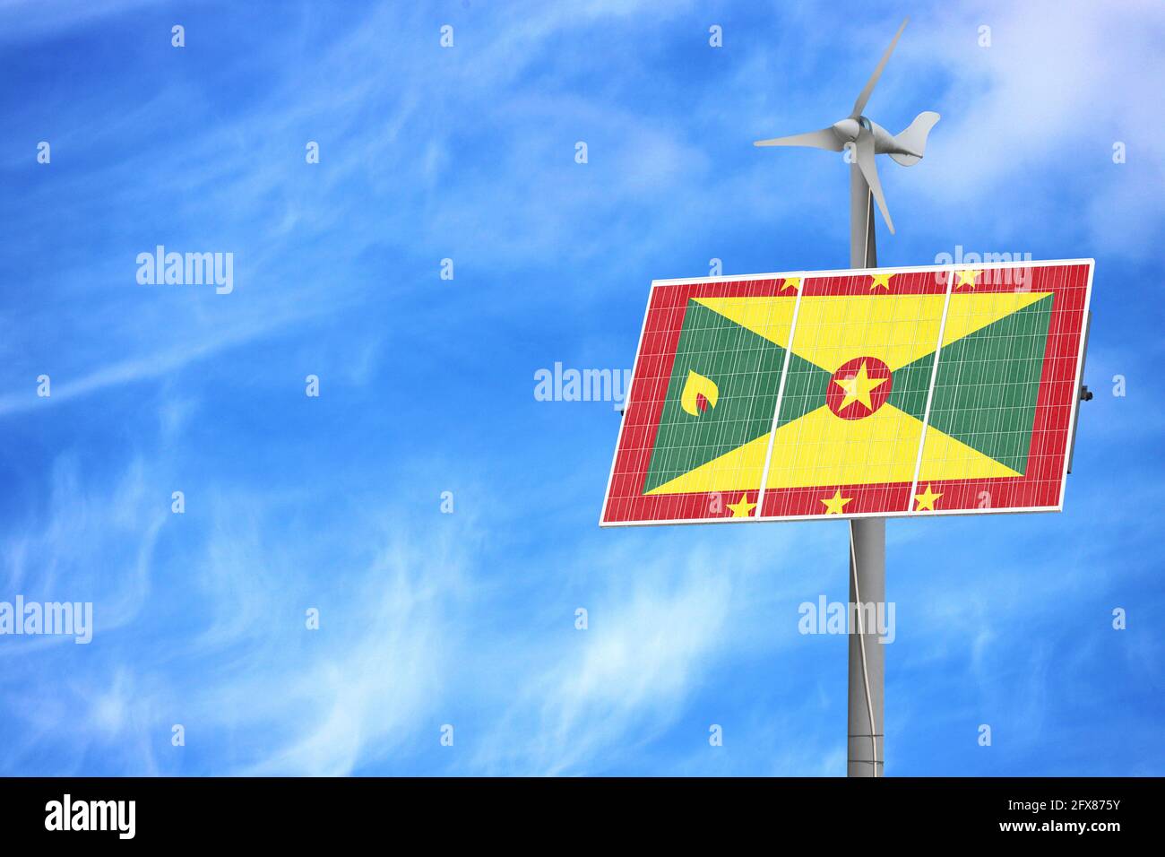 Solar panels against a blue sky with a picture of the flag of Grenada ...