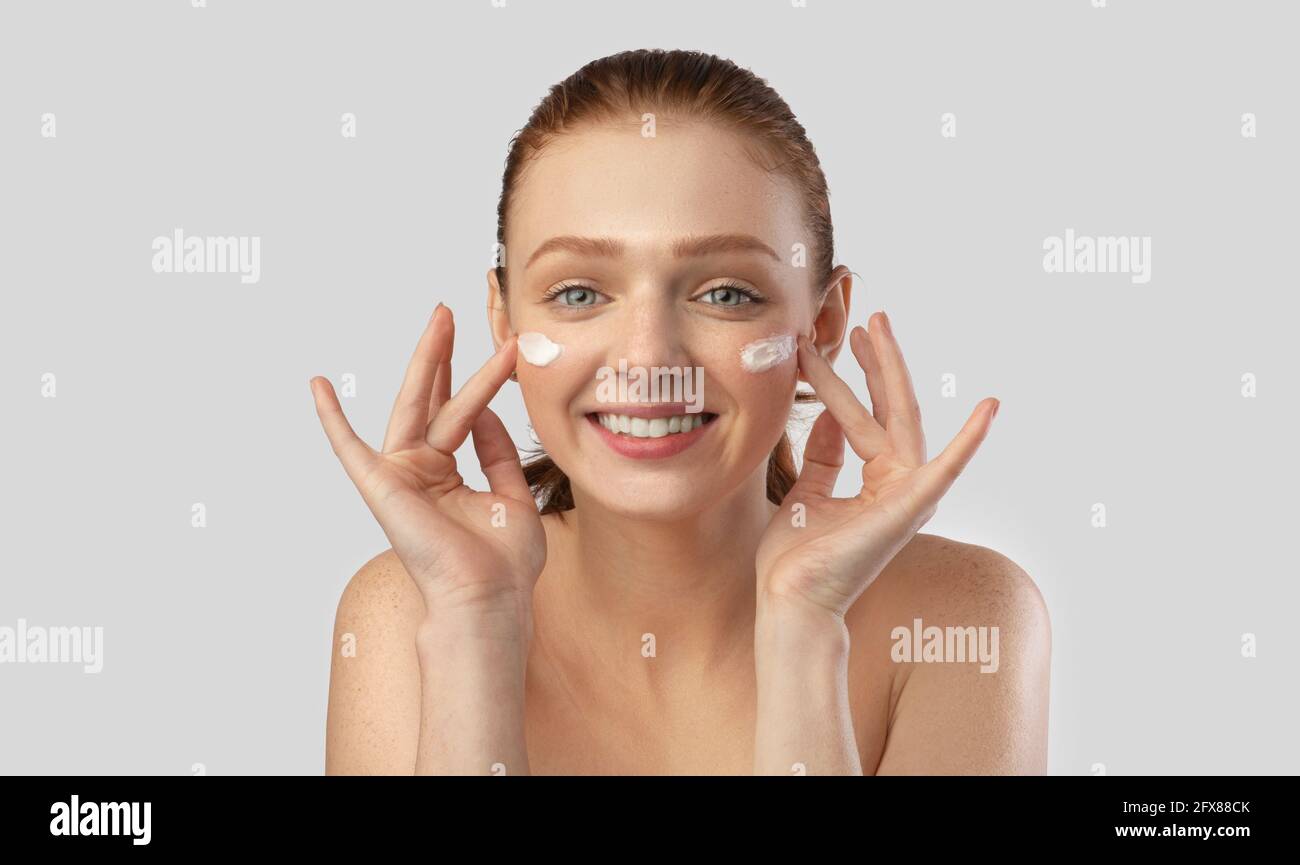 Female lady face face cream hi-res stock photography and images - Alamy