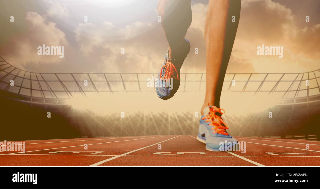 Composition of legs of running athlete on racing track in sports ...