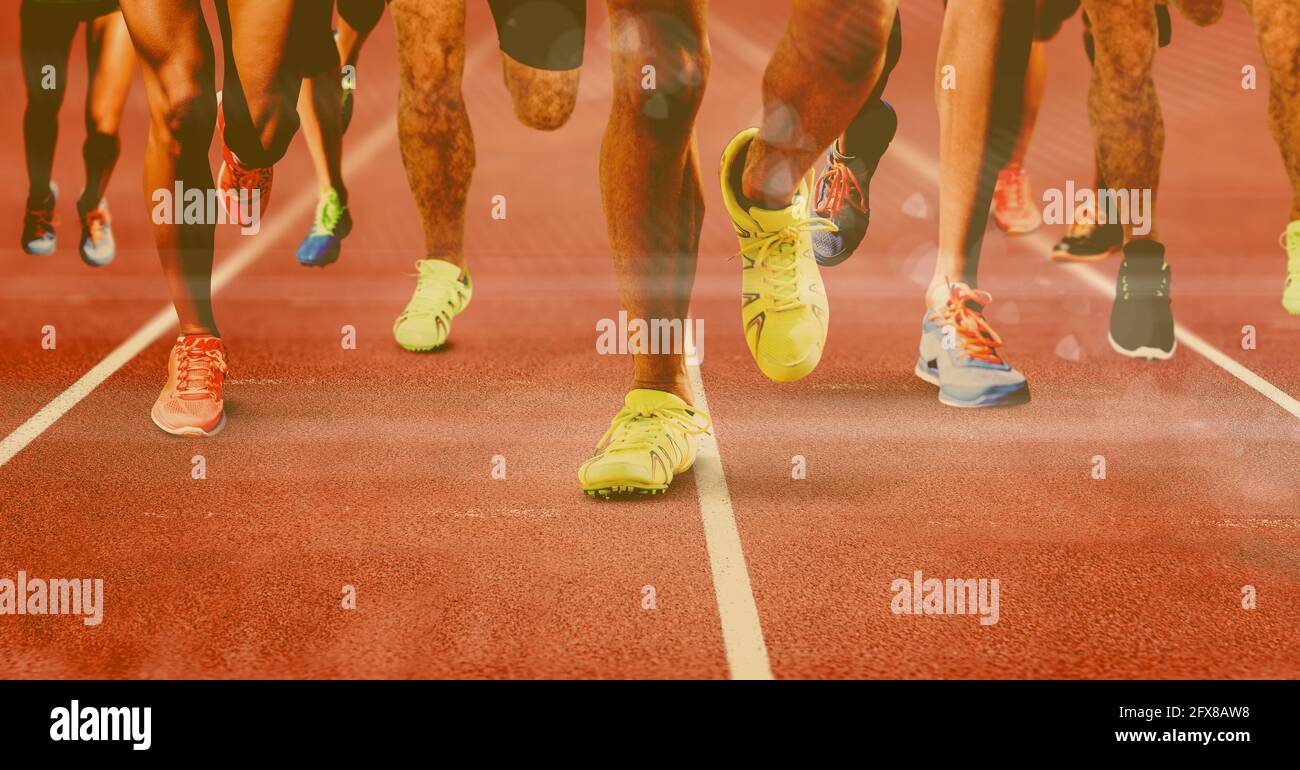 Composition of legs of running male athletes on racing track Stock ...