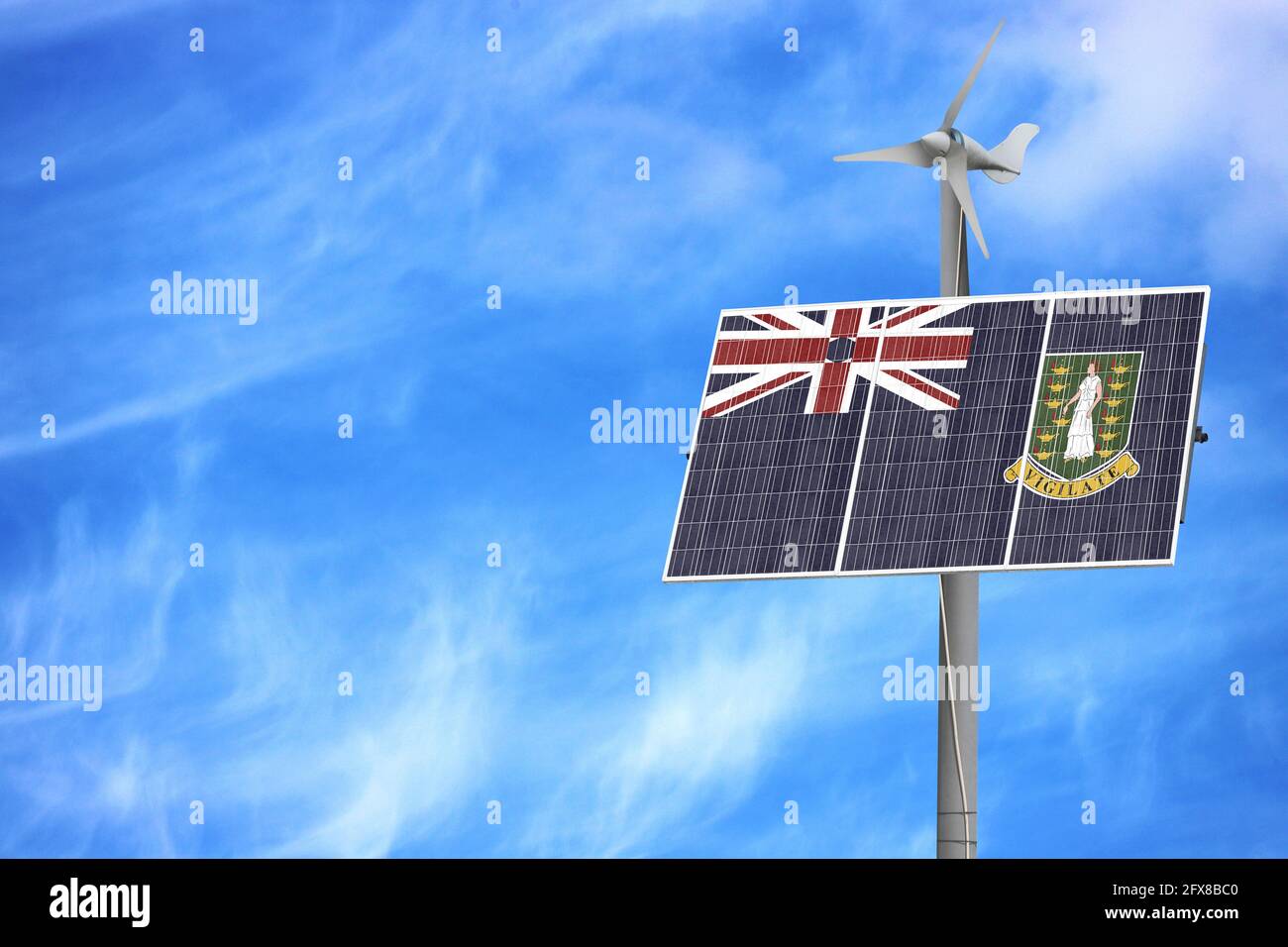 Solar panels against a blue sky with a picture of the flag of British ...