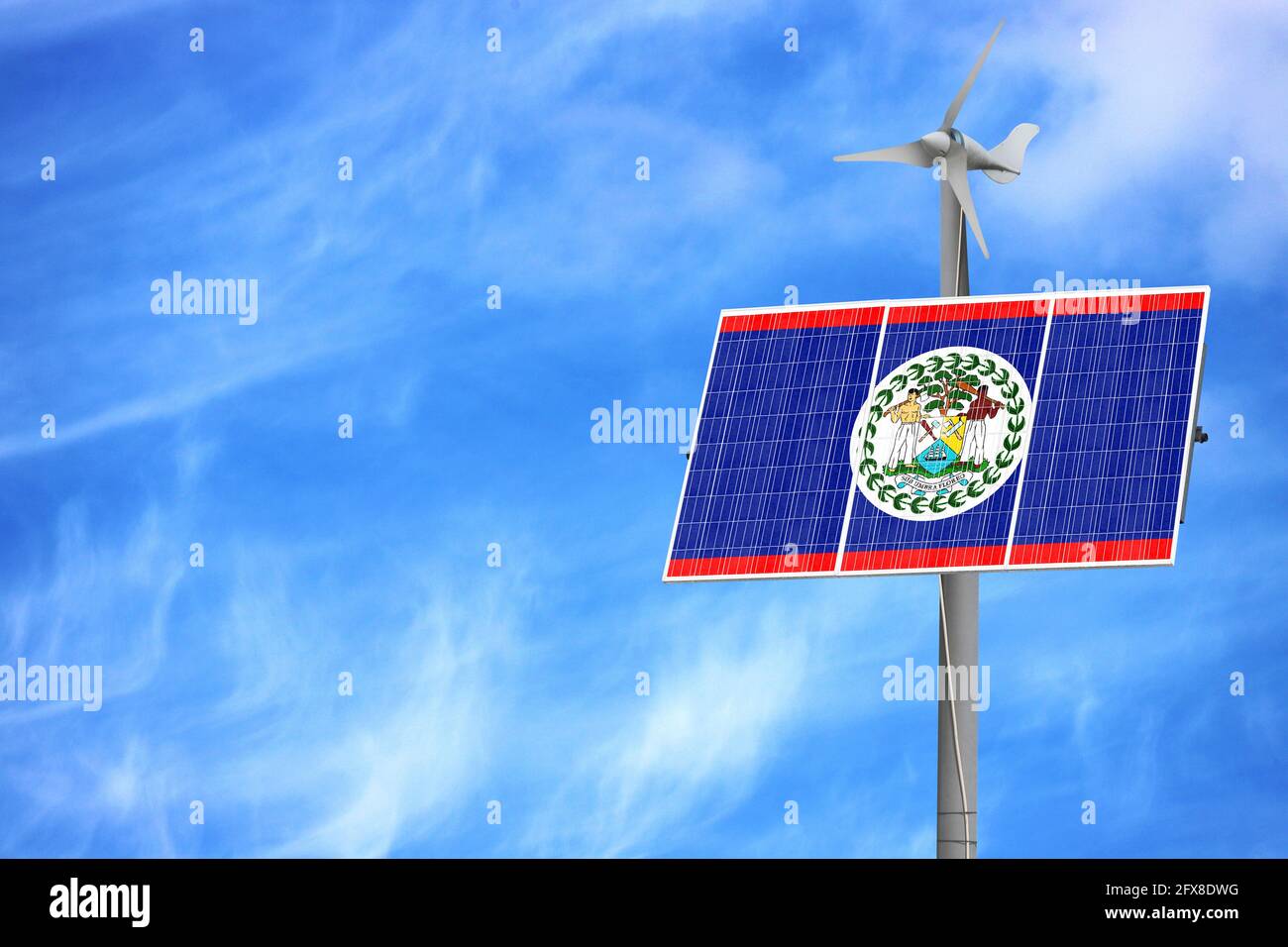 Solar panels against a blue sky with a picture of the flag of Belize ...