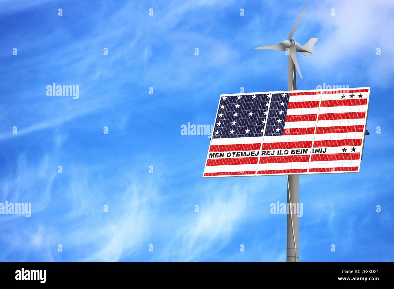 Solar panels against a blue sky with a picture of the flag of Bikini ...