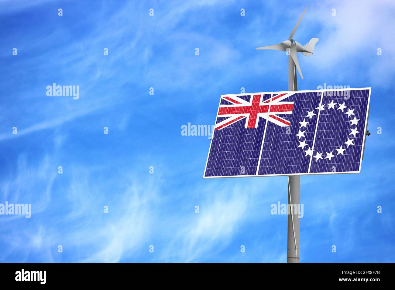 Solar panels against a blue sky with a picture of the flag of Cook ...