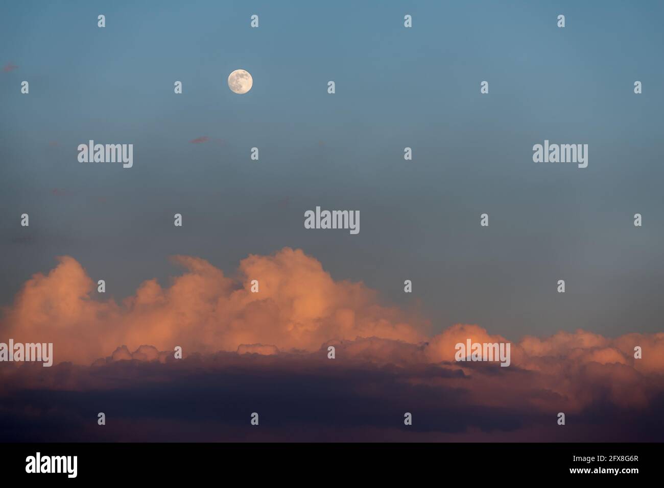 Moon with sunset sky background Stock Photo - Alamy
