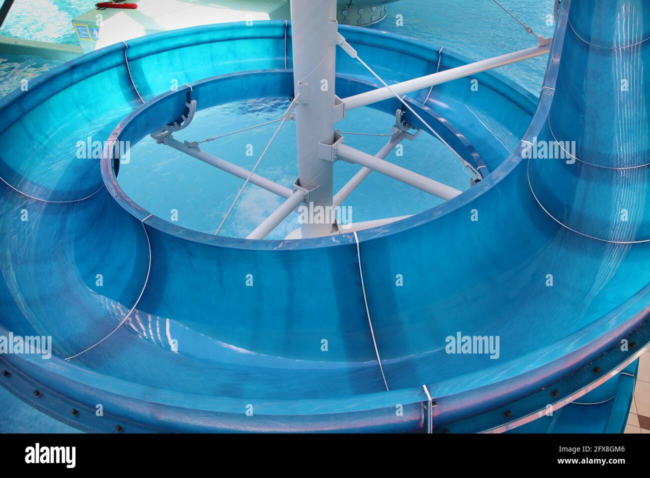 Blue slide in a water park Stock Photo - Alamy