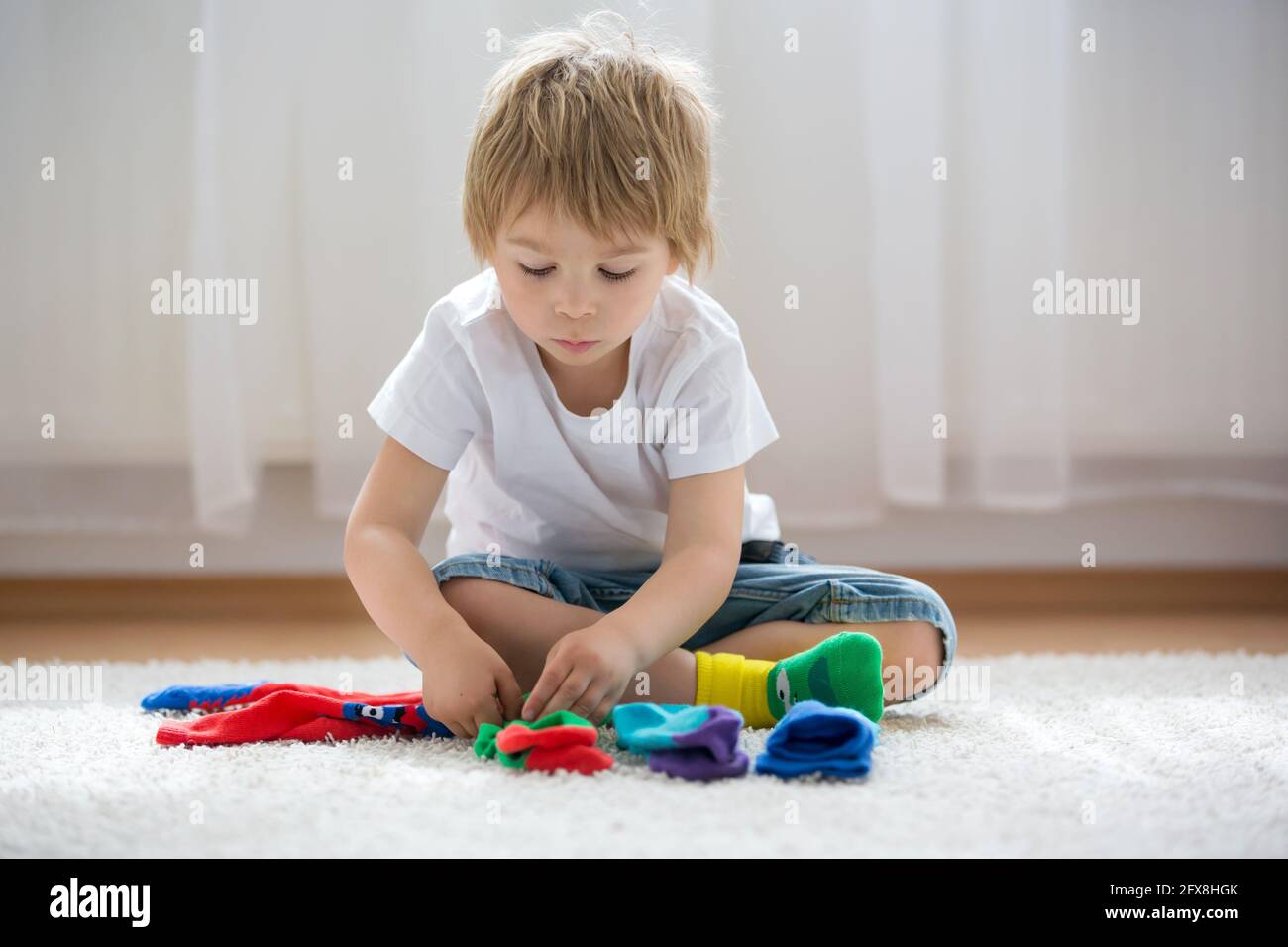 Row Of Feet With Socks High Resolution Stock Photography and Images - Alamy