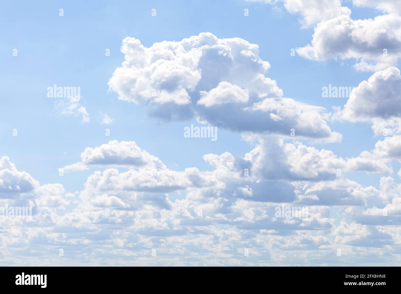 Simple soft cloudy blue sky background, many clouds, day time, sunlight ...