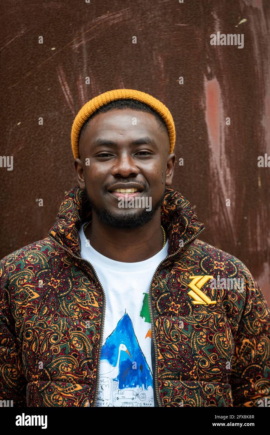 London, UK. 26 May 2021. Koby Martin poses with his work "Spotlight ...