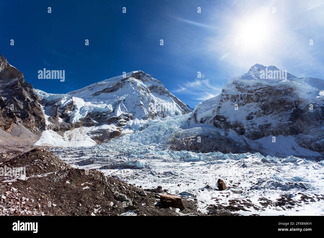 Morning sun above Mount Everest, lhotse and Nuptse from Pumo Ri base ...