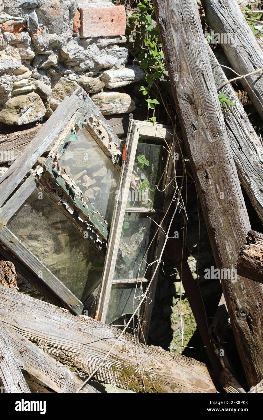 wooden planks window frames and rubble of the house destroyed after a ...