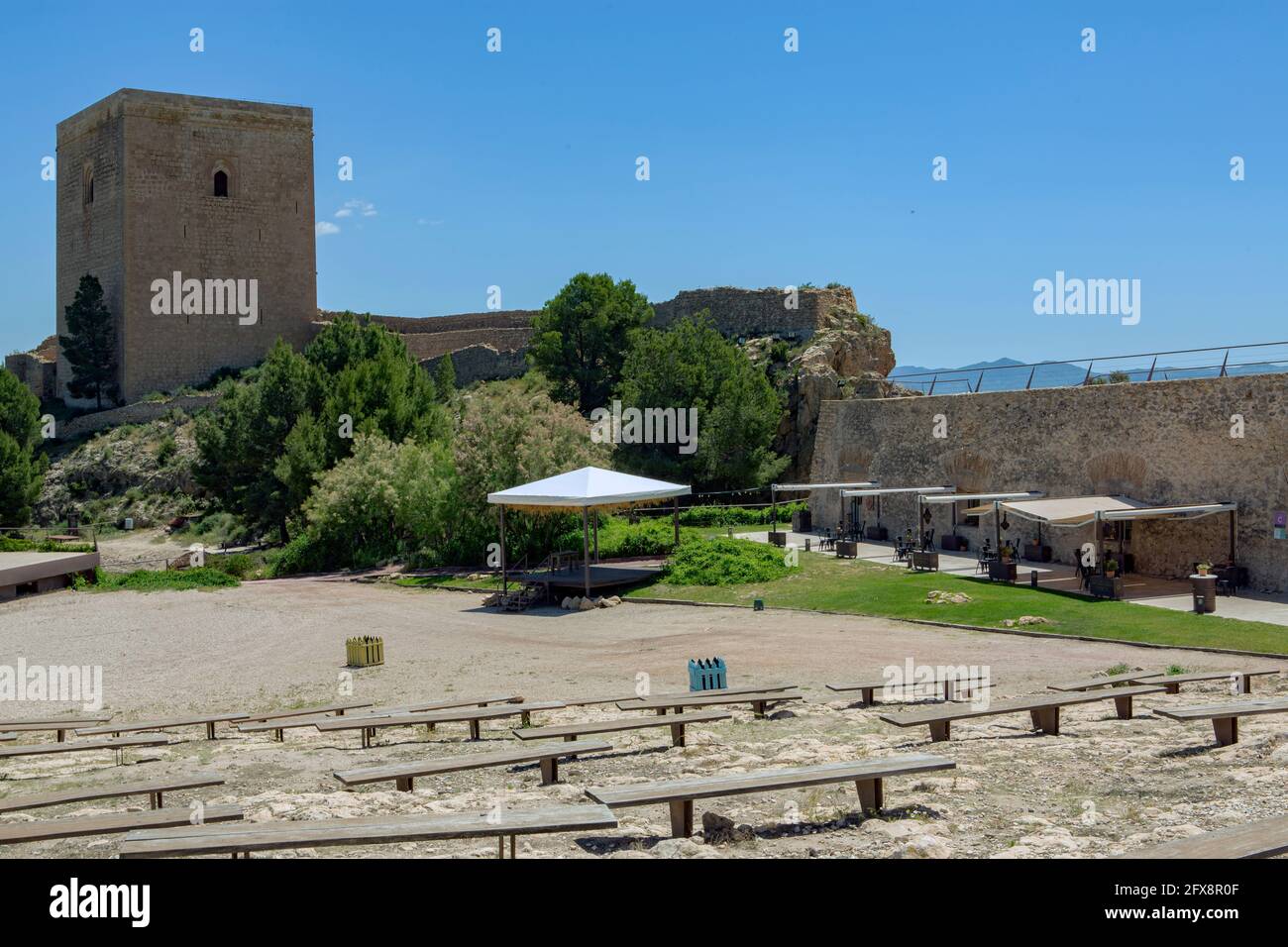 Torre Alfonsina inside of the Lorca castle in Spain,with wooden seats ...