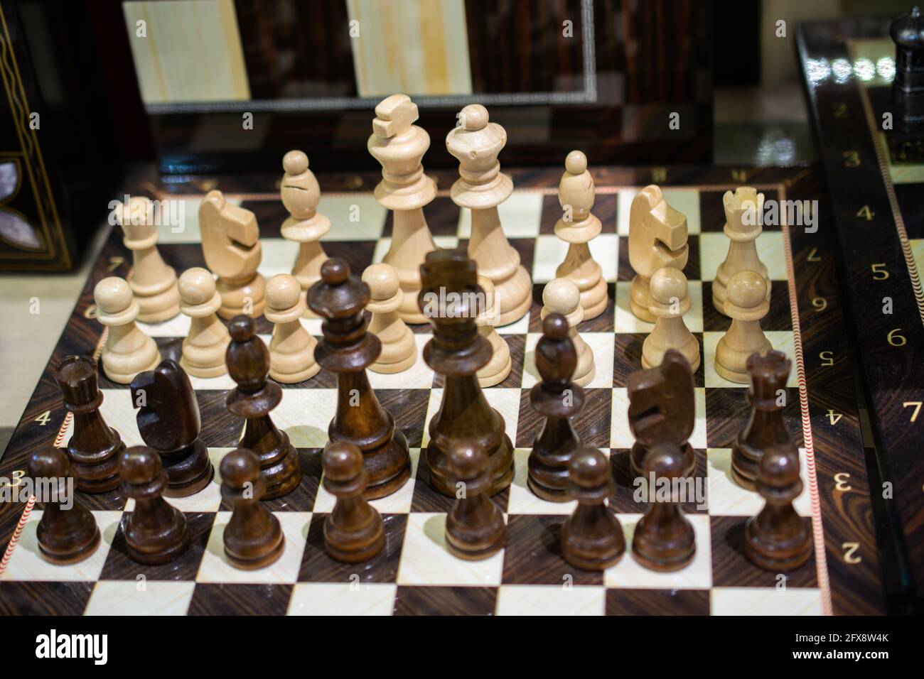 Intellectual game -chess. Wooden chess pieces on the chessboard Stock ...