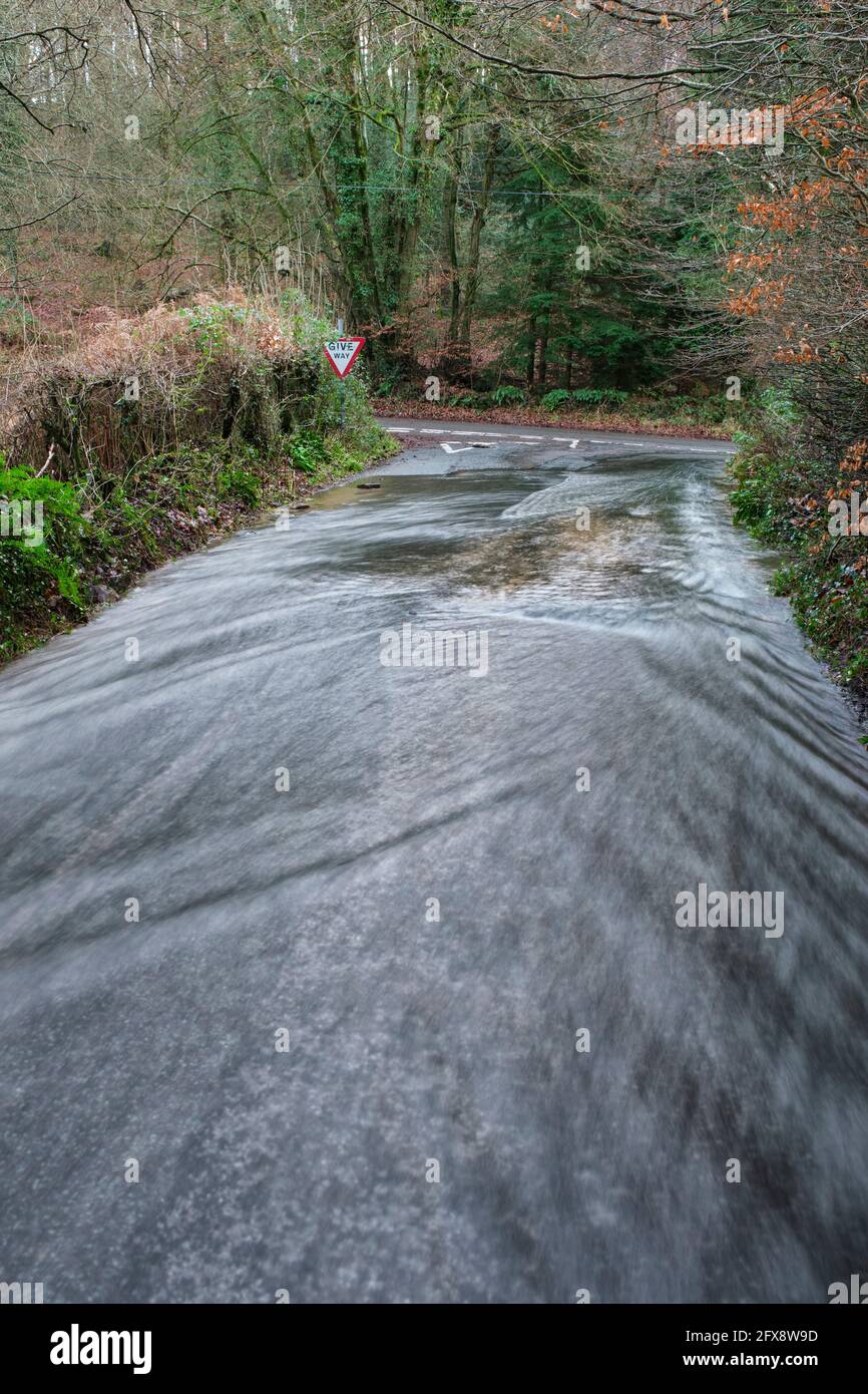 Rainwater flowing down the Trellech road towards Tintern Stock Photo ...