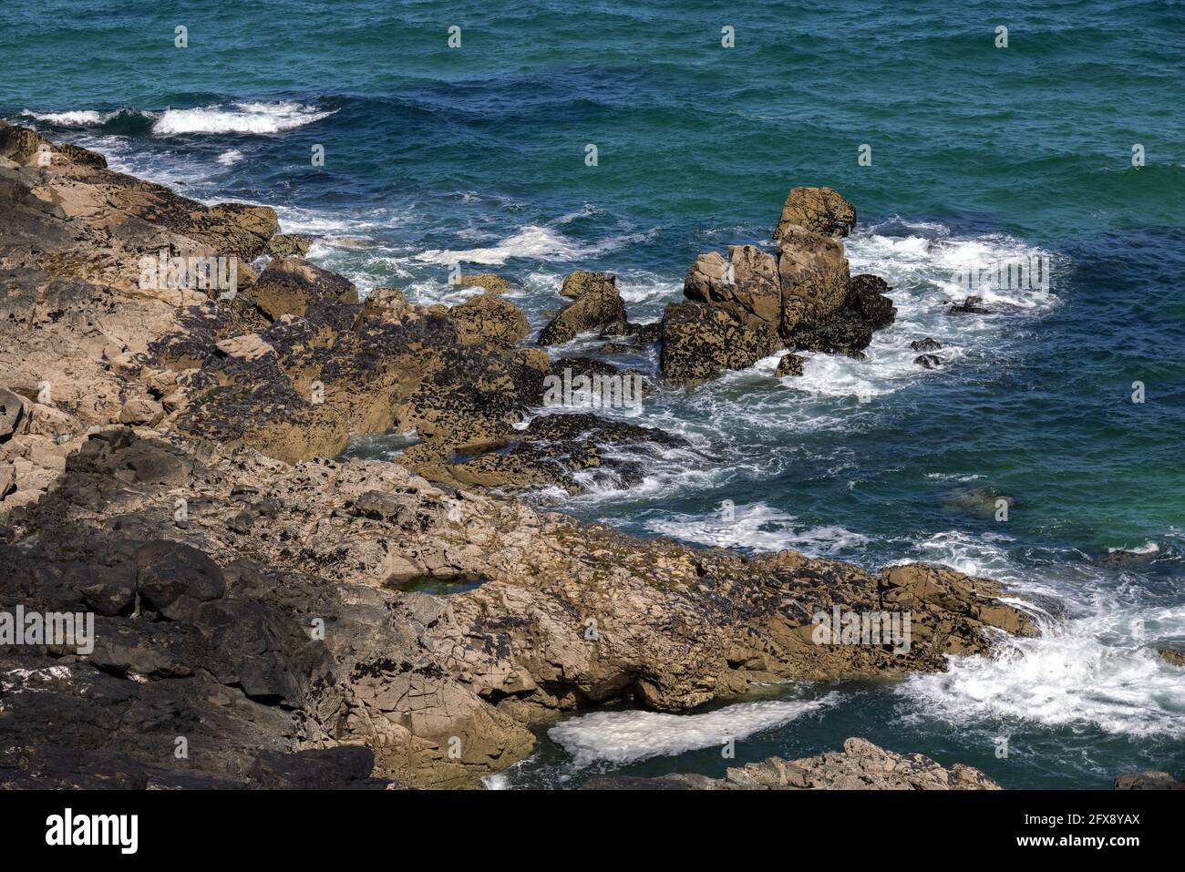 Rocky coastline near Porthgwidden beach at St Ives in Cornwall Stock ...