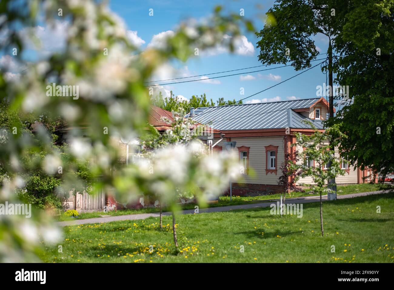 Retro traditional old village house and beautiful defocus floral ...