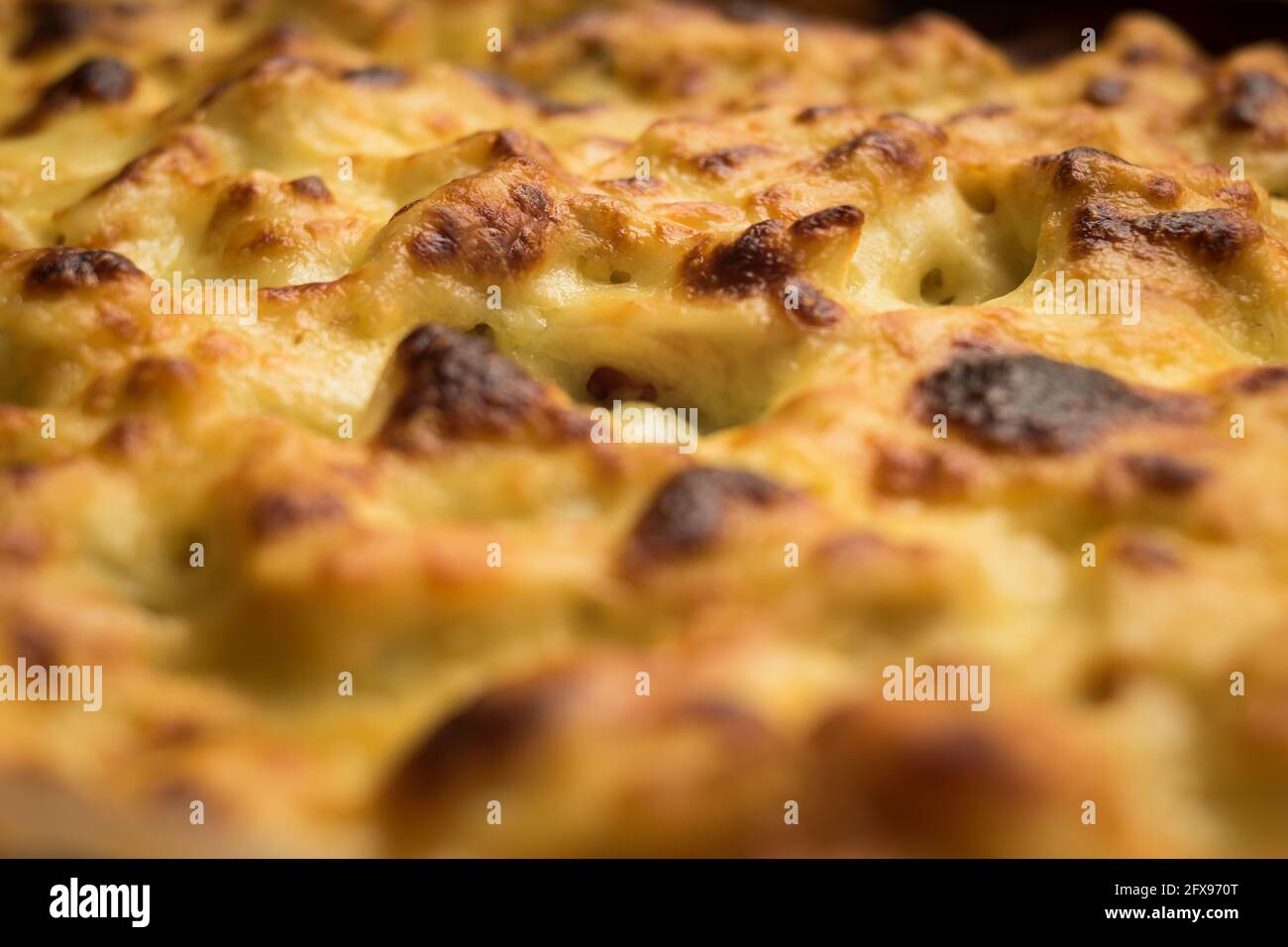Crispy cheese topping hi-res stock photography and images - Alamy