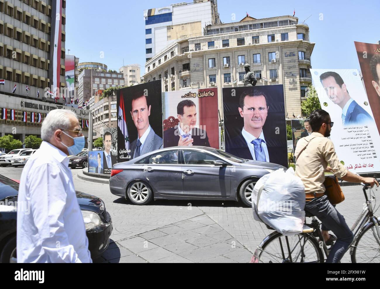 Damascus, May 26, 2021, Posters of Syrian President Bashar al-Assad are ...